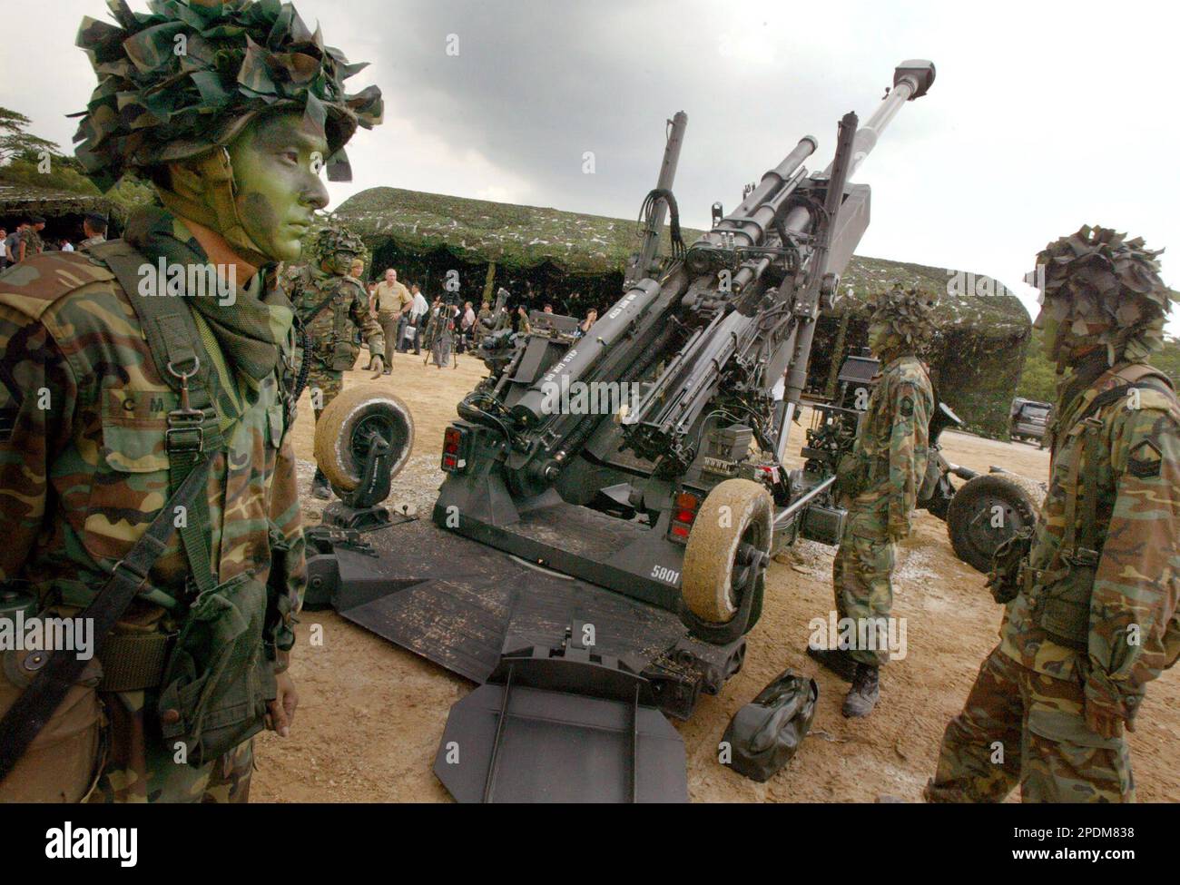 Singapore Armed Forces soldiers stand guard around the Pegasus, a Light ...