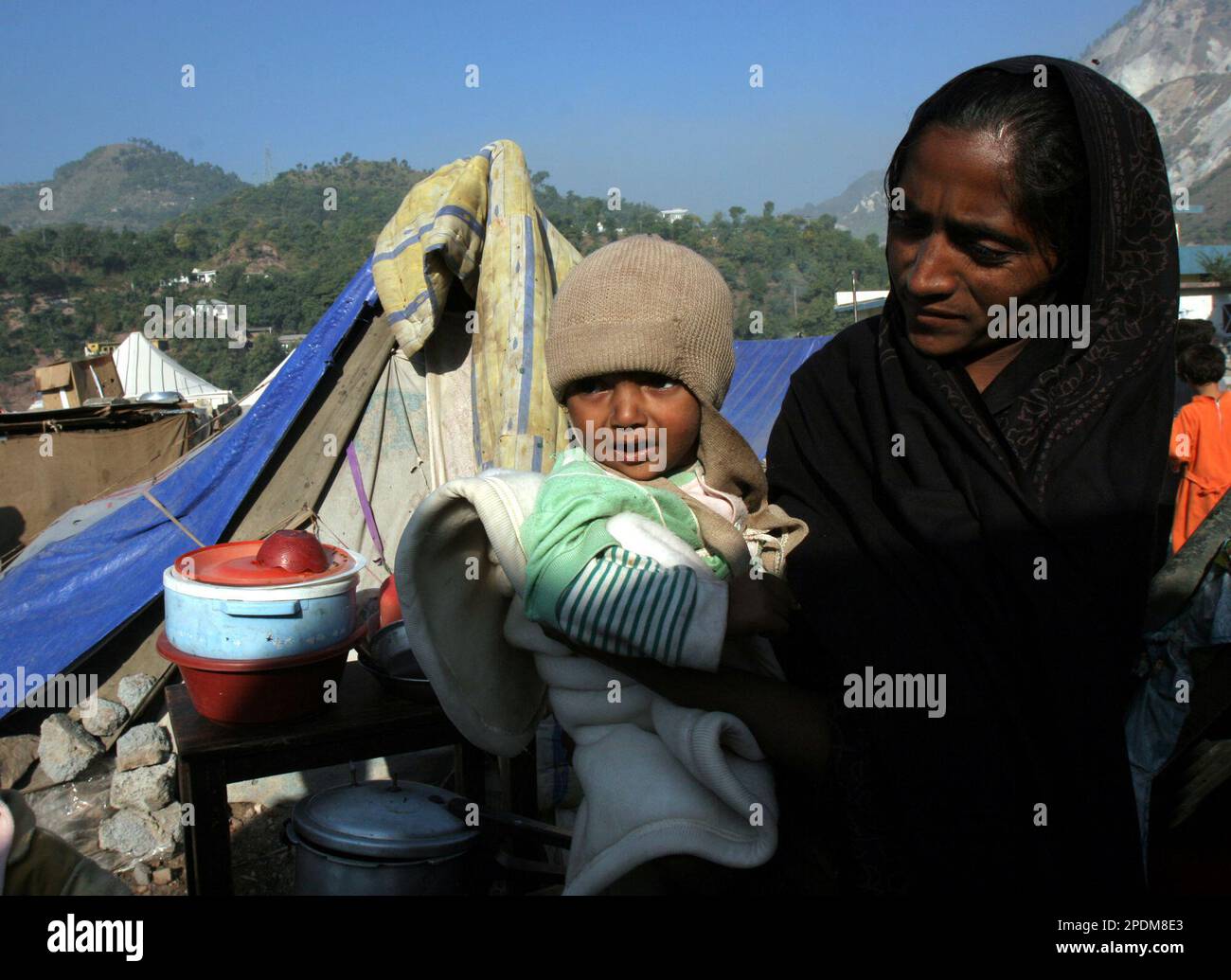 A Kashmiri earthquake survivor woman, living in miserable conditions ...