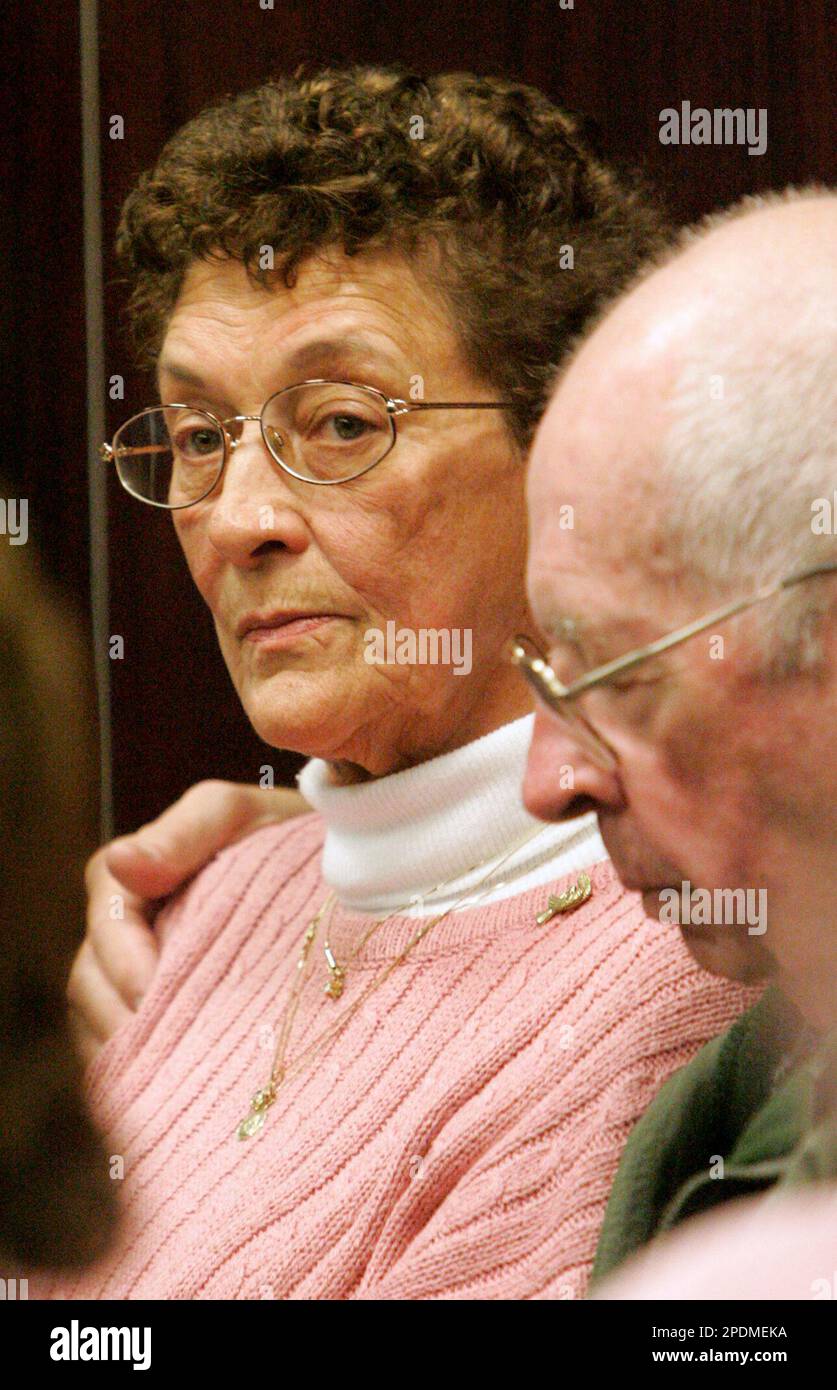 Elizabeth Trimble Bresley, mother of defendant James Trimble, listens ...