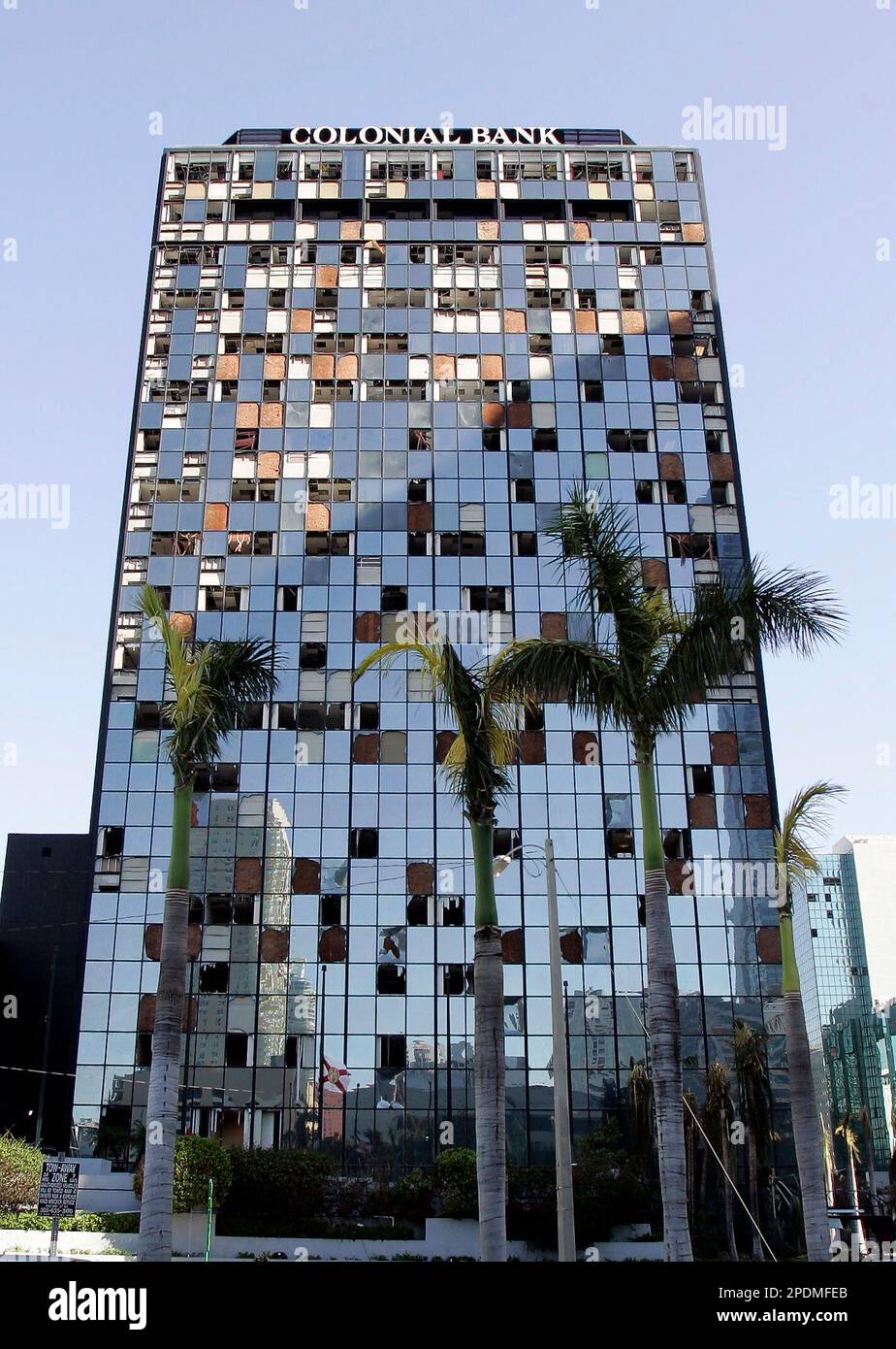 Damage caused by Hurricane Wilma to the Colonial Bank building is shown ...