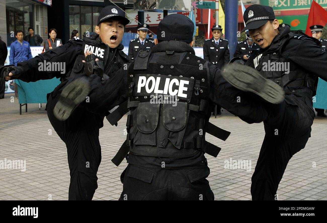 Chinese riot police officers demonstrate unarmed combat during a police ...