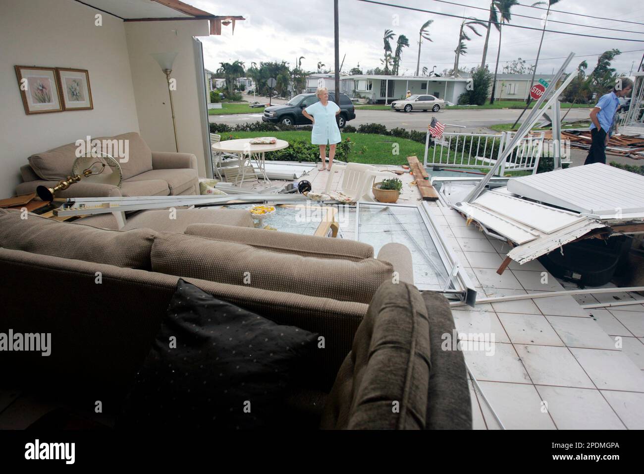 Barbara Cassidy stands outside her Davie, Fla. mobile home, a house ...