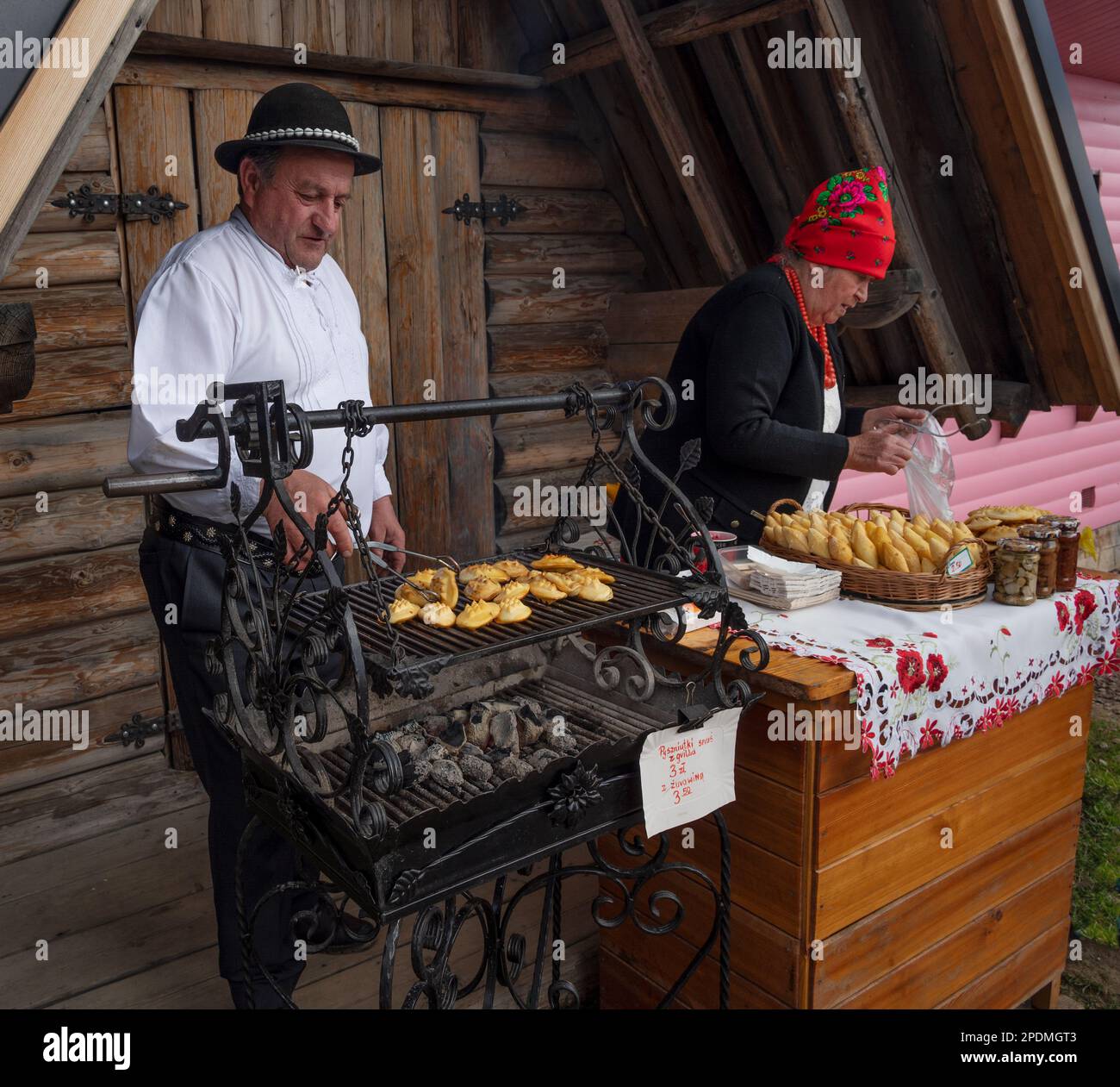 Local villagers selling Oscypek, a smoked cheese made of salted sheep ...