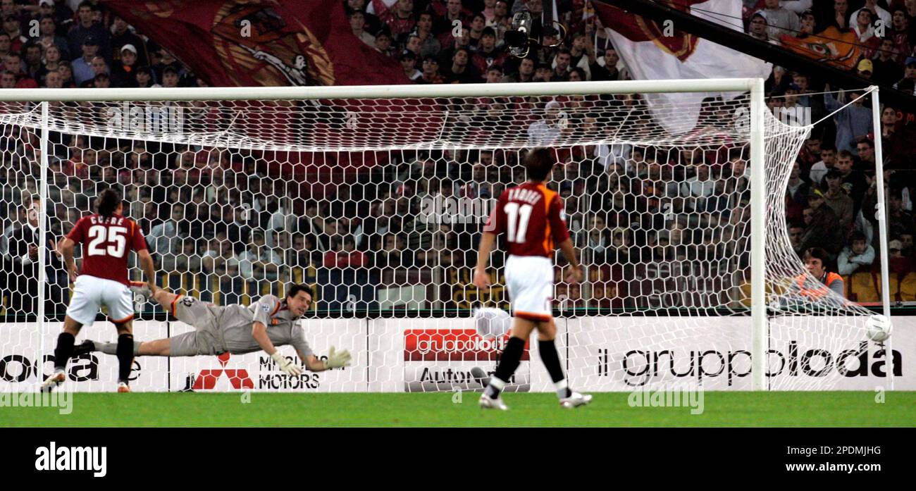 AS Roma's goalkeeper Doni of Brazil, in gray, misses the save and lets ...