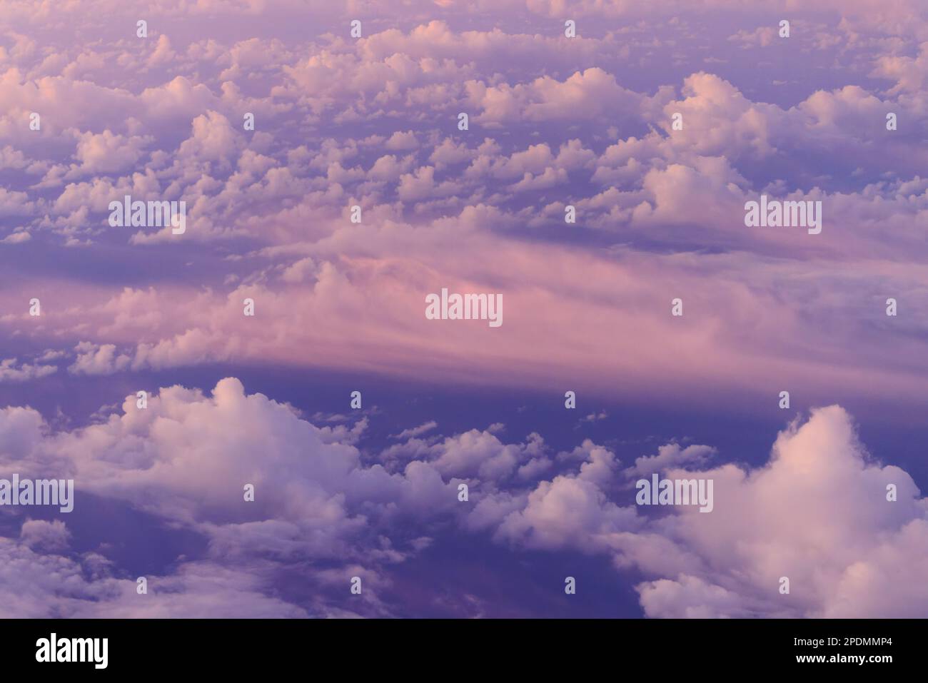 First light of morning on clouds in pink and blue at elevation Stock ...