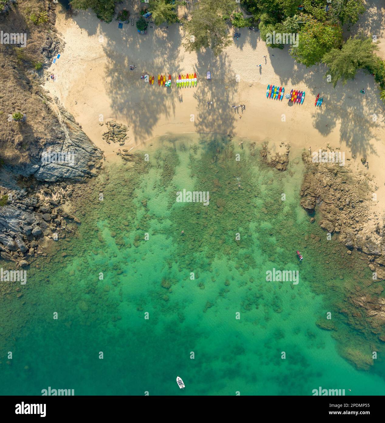 aerial panorama view above turquoise sea around Nui beach small beach ...