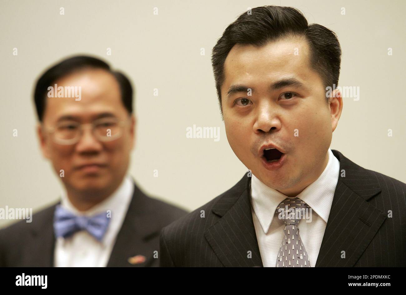 Hong Kong's new justice secretary Wong Yan Lung, right, speaks during a ...