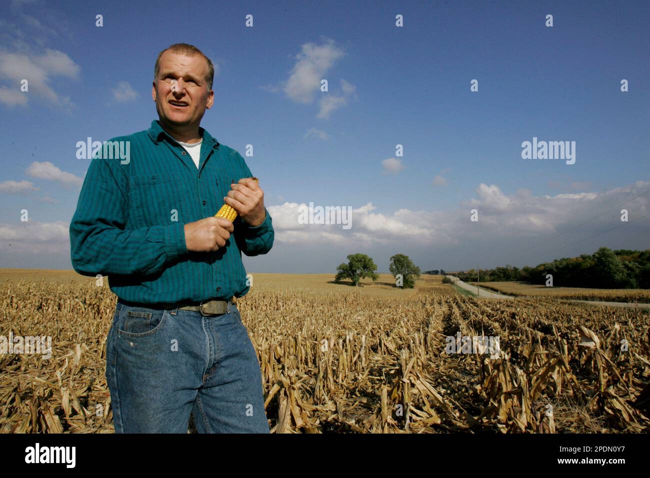 Dave Nielsen of Raymond, Neb., looks over his endless field of ...