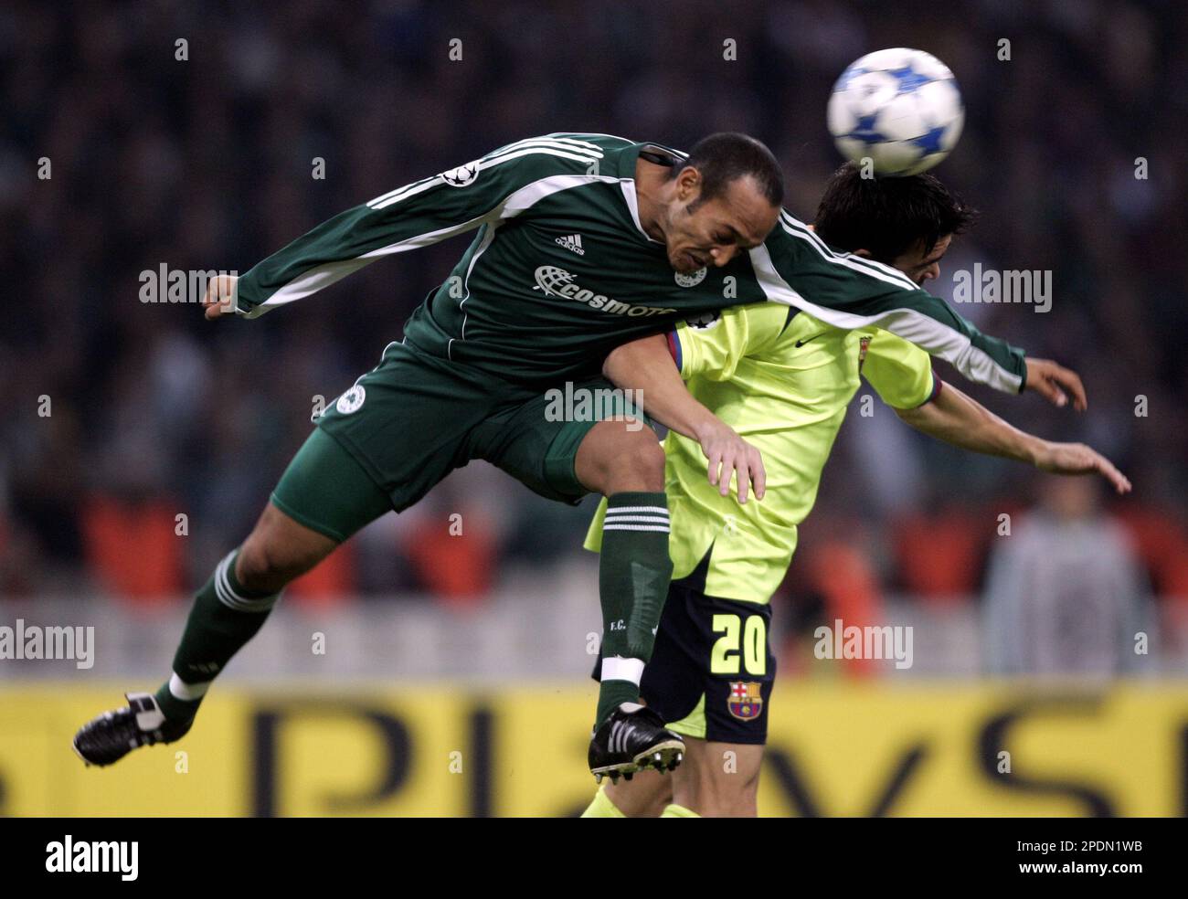 Panathinaikos' Nasief Morris of South Africa clears the ball in front ...