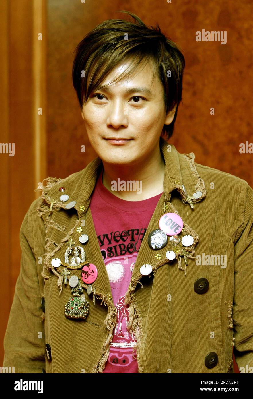 Taiwan singer Jeff Chang poses after the opening ceremony of launching ...