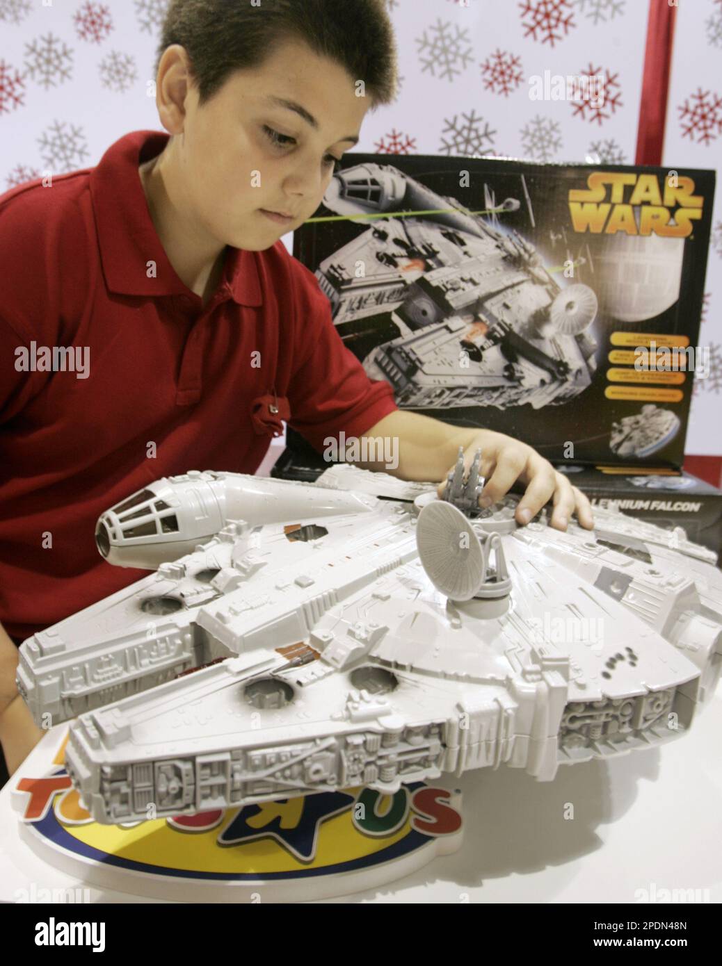 Tom Conboy, 11, of Elmwood Park, N.J., checks out a Star Wars ...