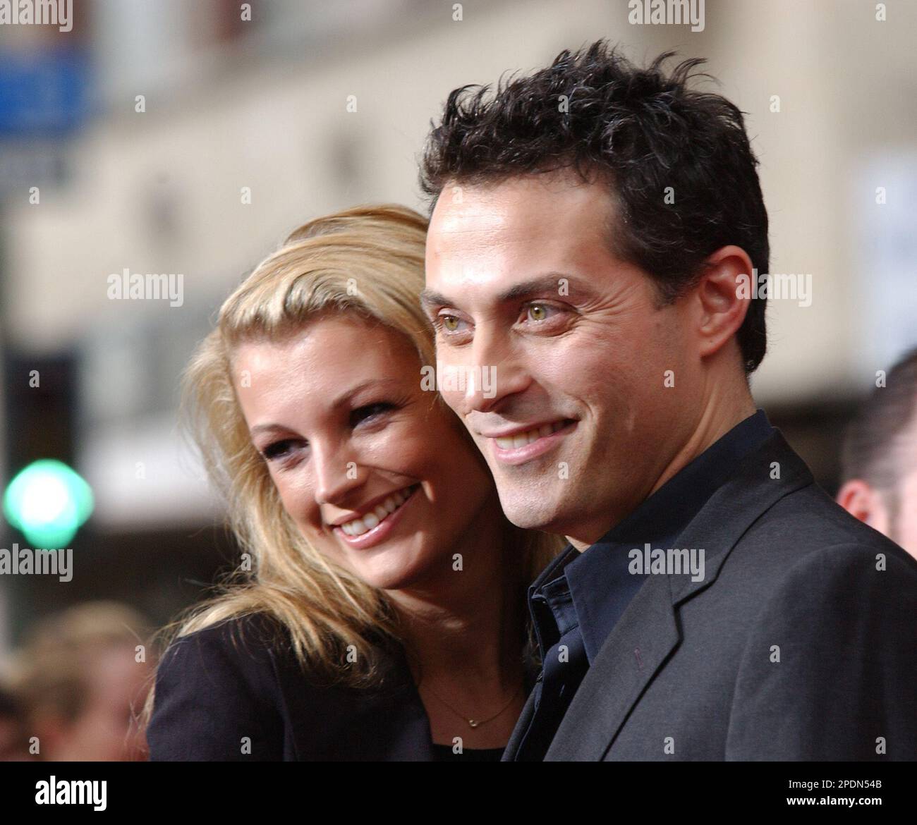 Rufus Sewell, left, and his wife Amy, right, pose for photographers on the red carpet before the ...