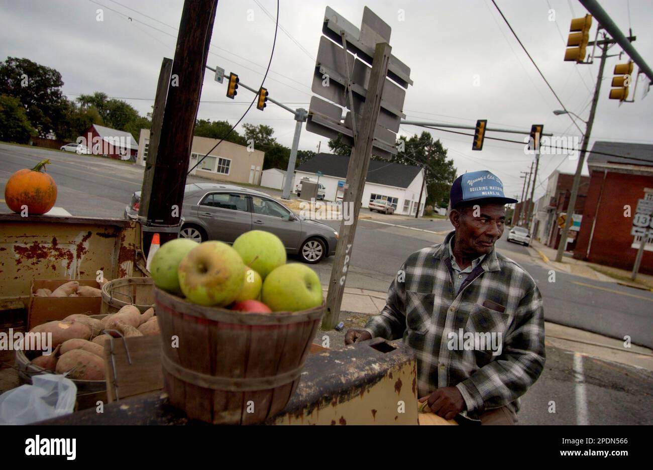 Ben Stevens sells local produce from the corner of Coastal Blvd. and ...