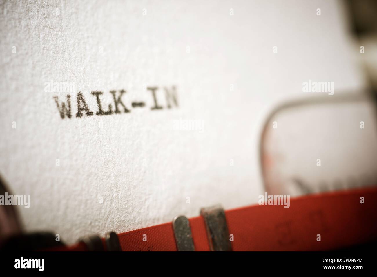 Walk-in word written with a typewriter Stock Photo - Alamy