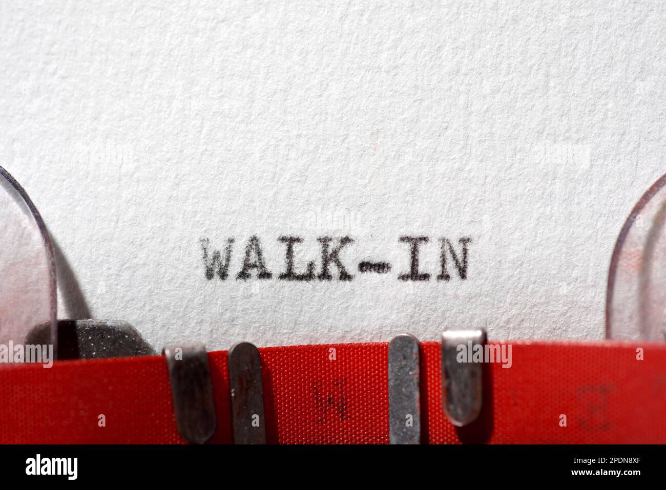 Walk-in word written with a typewriter Stock Photo - Alamy