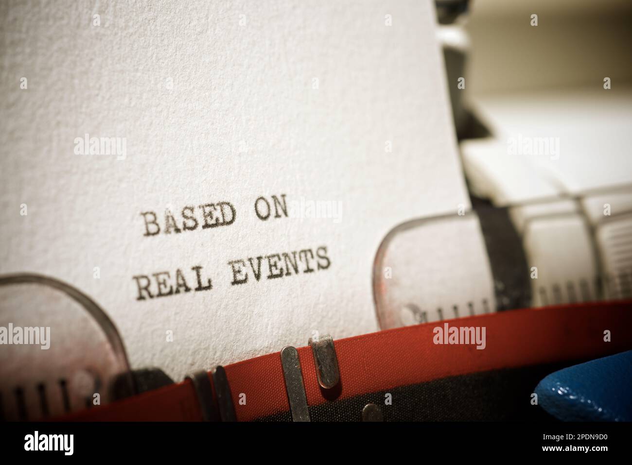 Based on real events text written with a typewriter Stock Photo - Alamy
