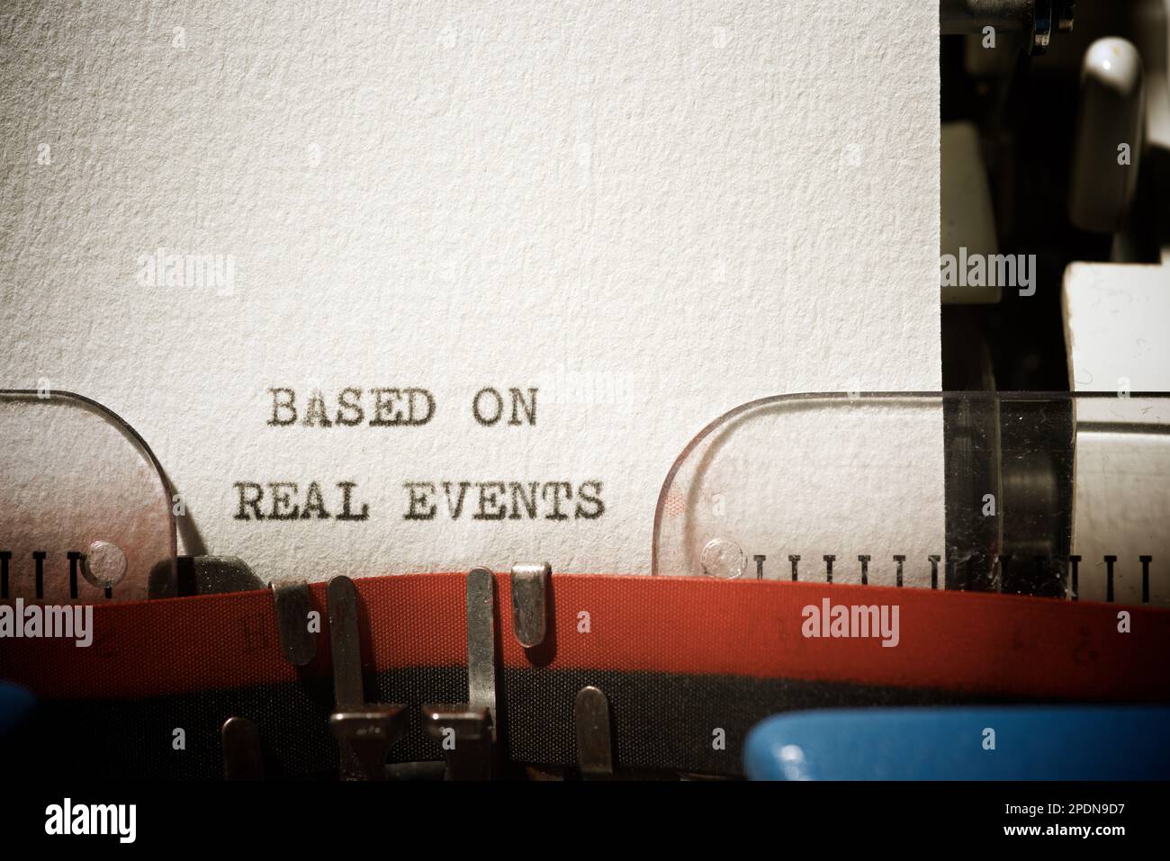 Based on real events text written with a typewriter Stock Photo - Alamy