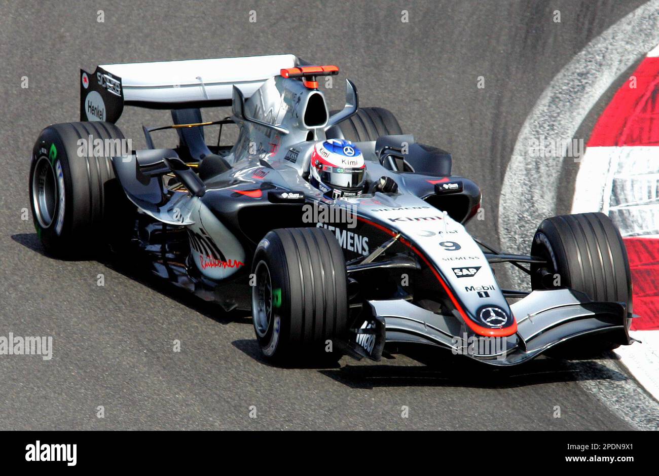 Finland's Kimi Raikkonen gets his McLaren Mercedes sideways during the ...