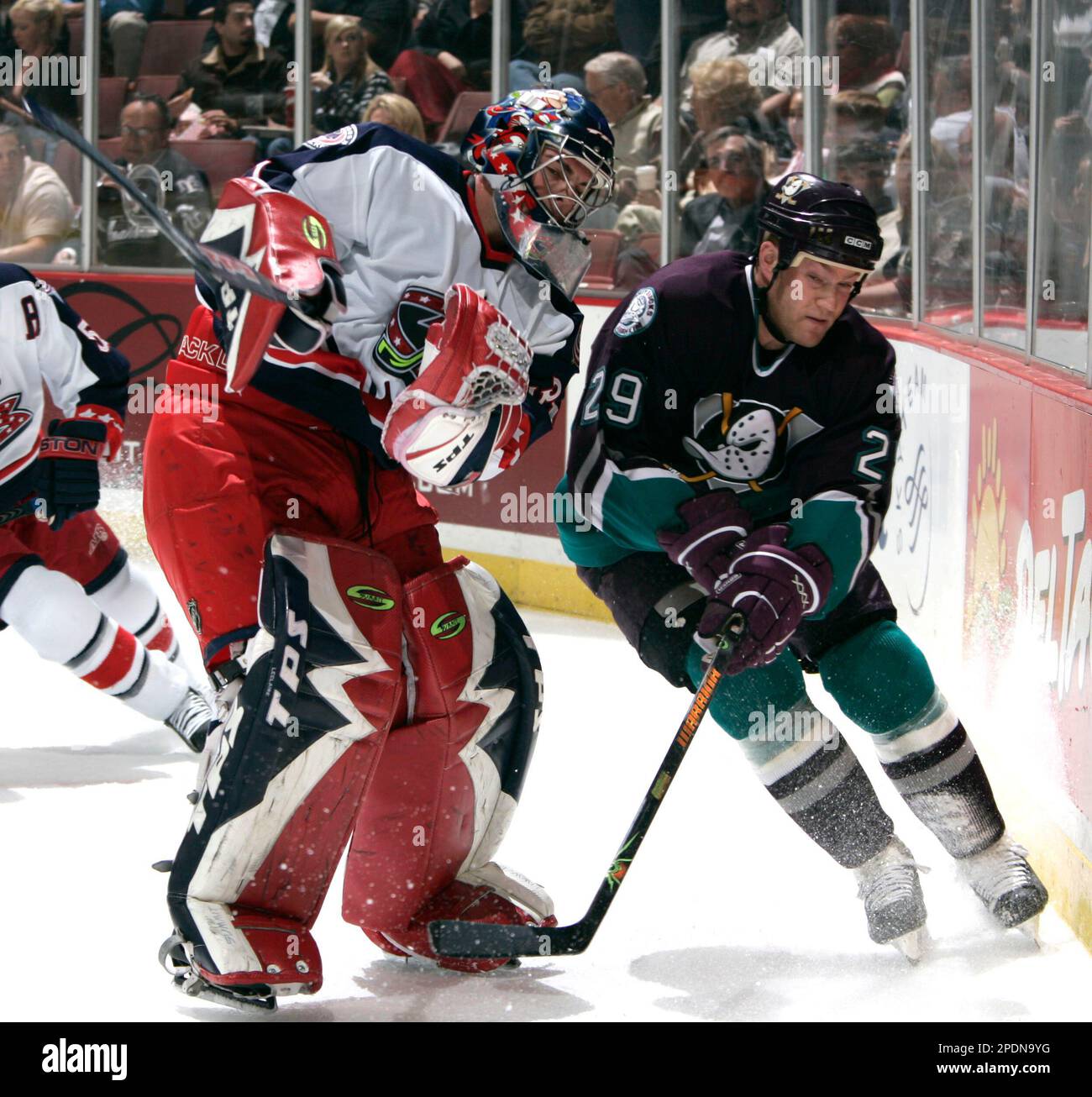 Columbus Blue Jackets goalie Pascal Leclaire clears the puck away from ...