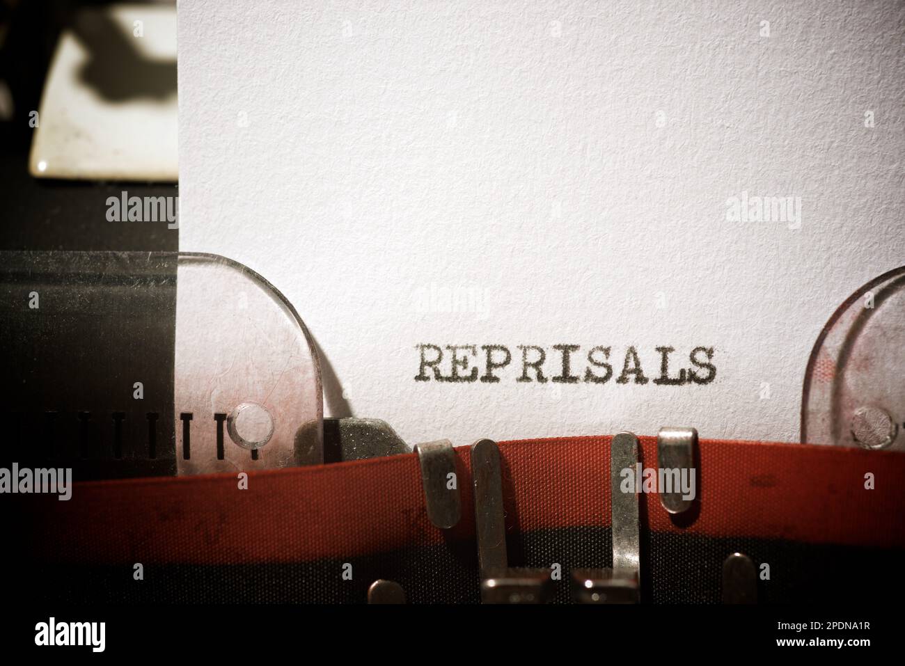 Reprisals word written with a typewriter Stock Photo - Alamy