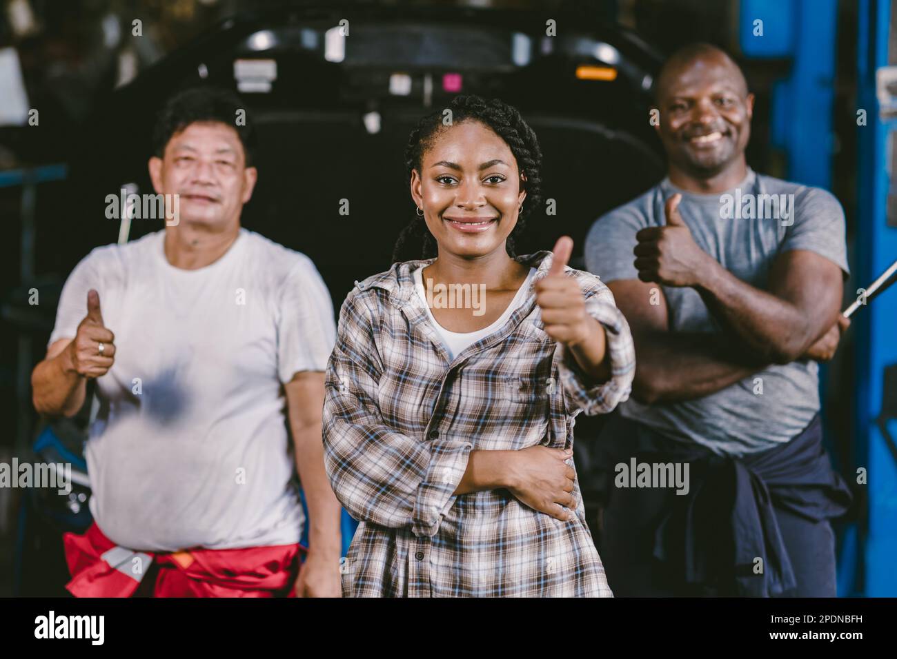 Group of diversity worker thumbs up smiling. Garage Mechanic team car ...