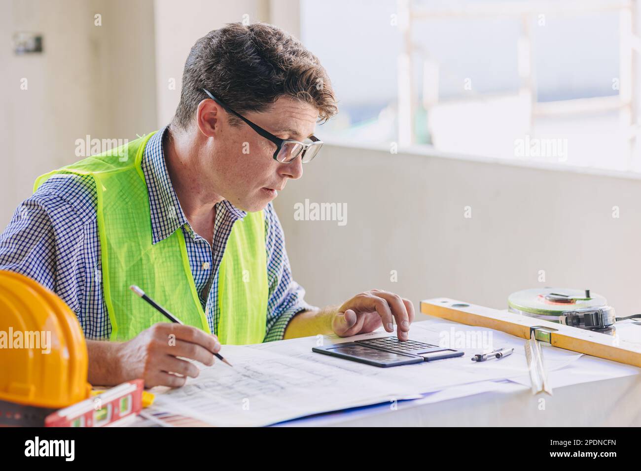 Engineer builder calculate construction bill cost surprised shock ...