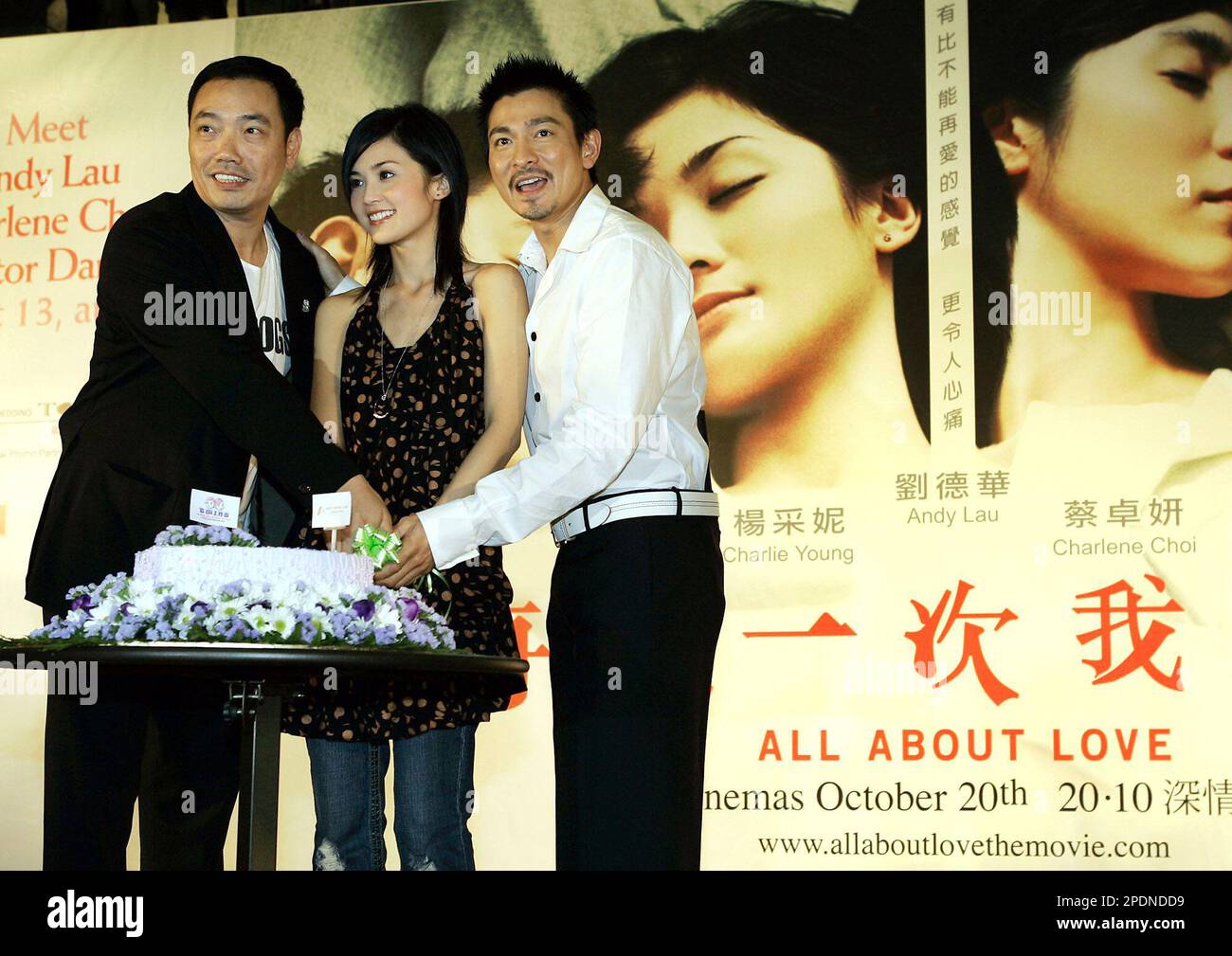 Hong Kong superstar Andy Lau, right, and Charlene Choi, center, and Director Daniel Yu cut a ...