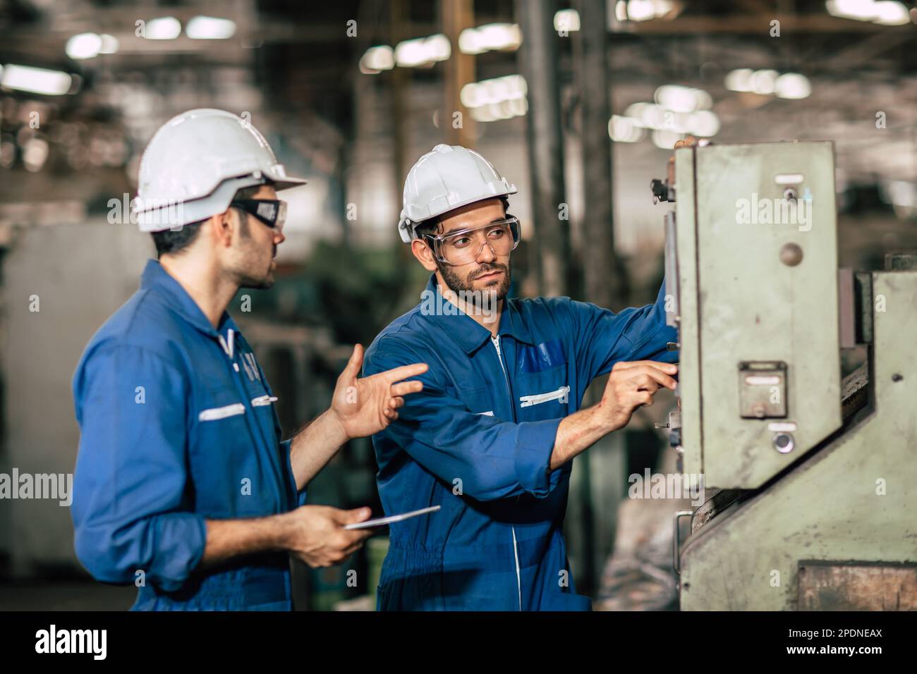 Engineer supervisor professional worker working team together training ...