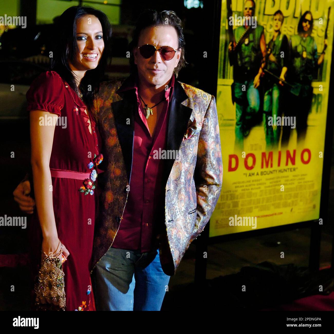 Mickey Rourke, one of the stars of the new film "Domino," arrives with ...