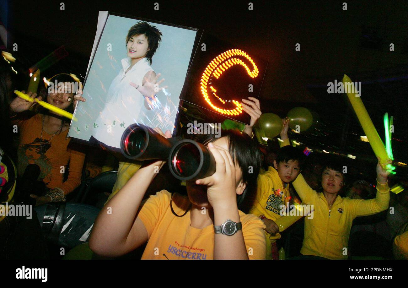 Fans of China's "Super Girls" try to catch a glimpse of their favorite ...