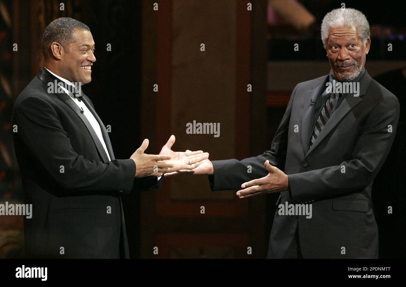 Actors Laurence Fishburne, left, and Morgan Freeman greet each other ...