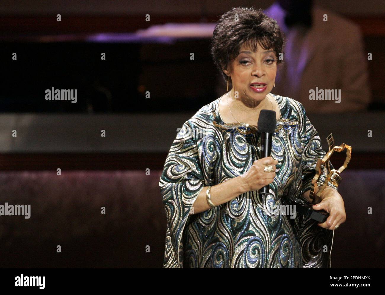 Actress Ruby Dee accepts an award on behalf of her late husband, actor ...