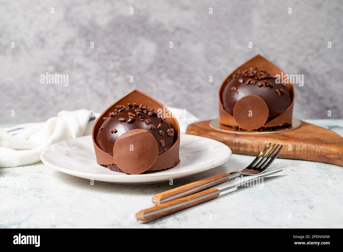 Chocolate small cake. Bakery desserts. Delicious round portion cake ...