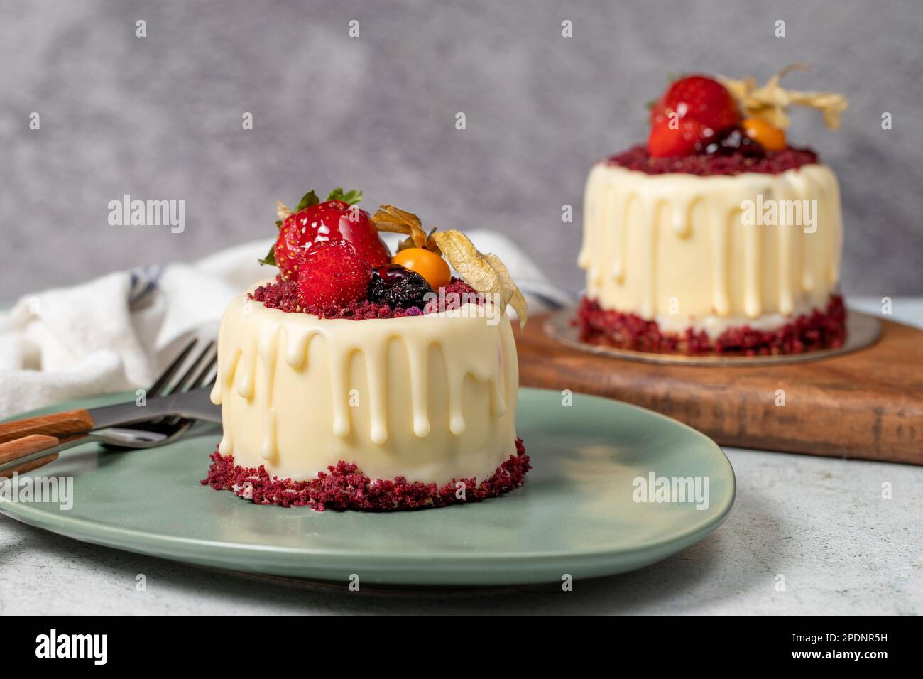 Fruit cream cake. Bakery desserts. Delicious round portion cake with ...