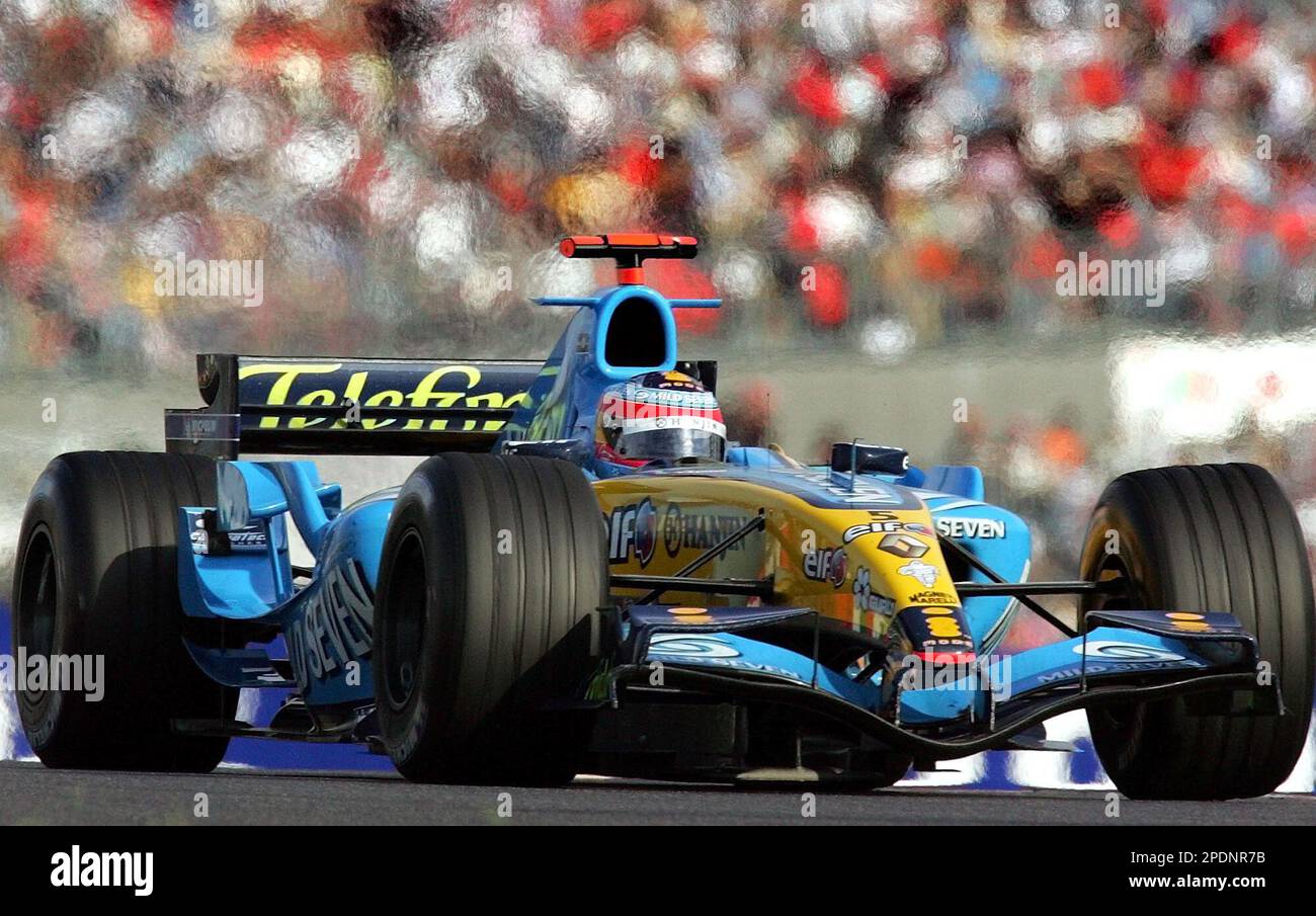 Spanish world champion Fernando Alonso steers his Renault to finish ...