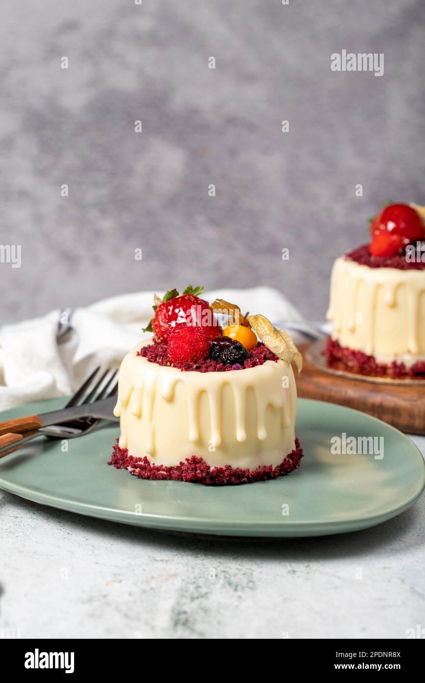 Fruit cream cake. Bakery desserts. Delicious round portion cake with ...