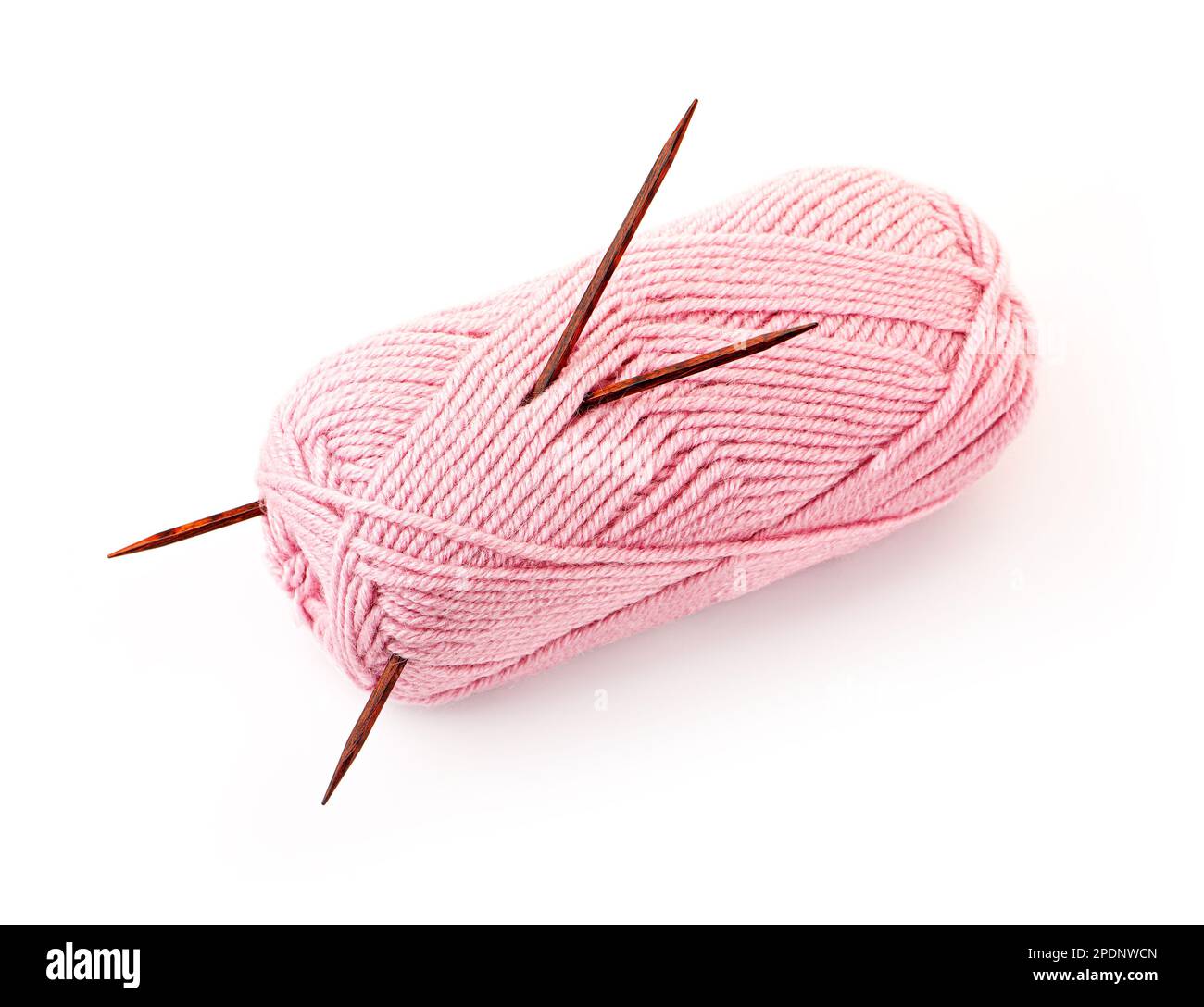Pink threads and Wooden knitting needles isolated on white background ...