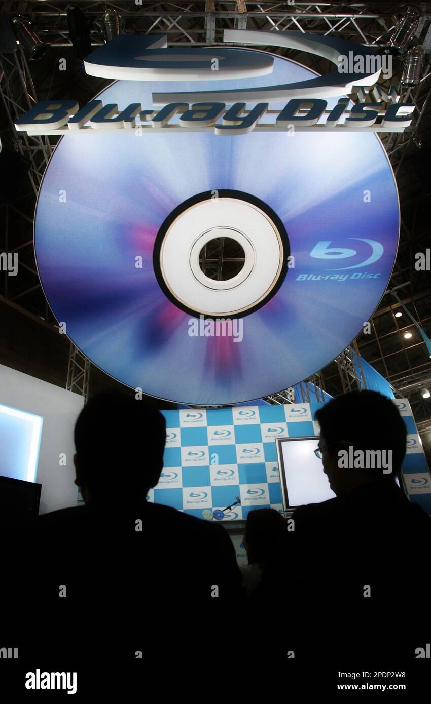Visitors gather around Blu Ray Disc booth during the CEATEC exhibition ...