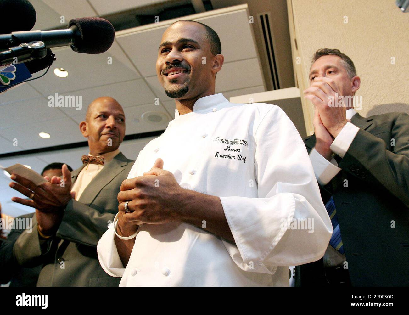 Flanked by Washington, D.C. Mayor Anthony Williams, left and the Food ...