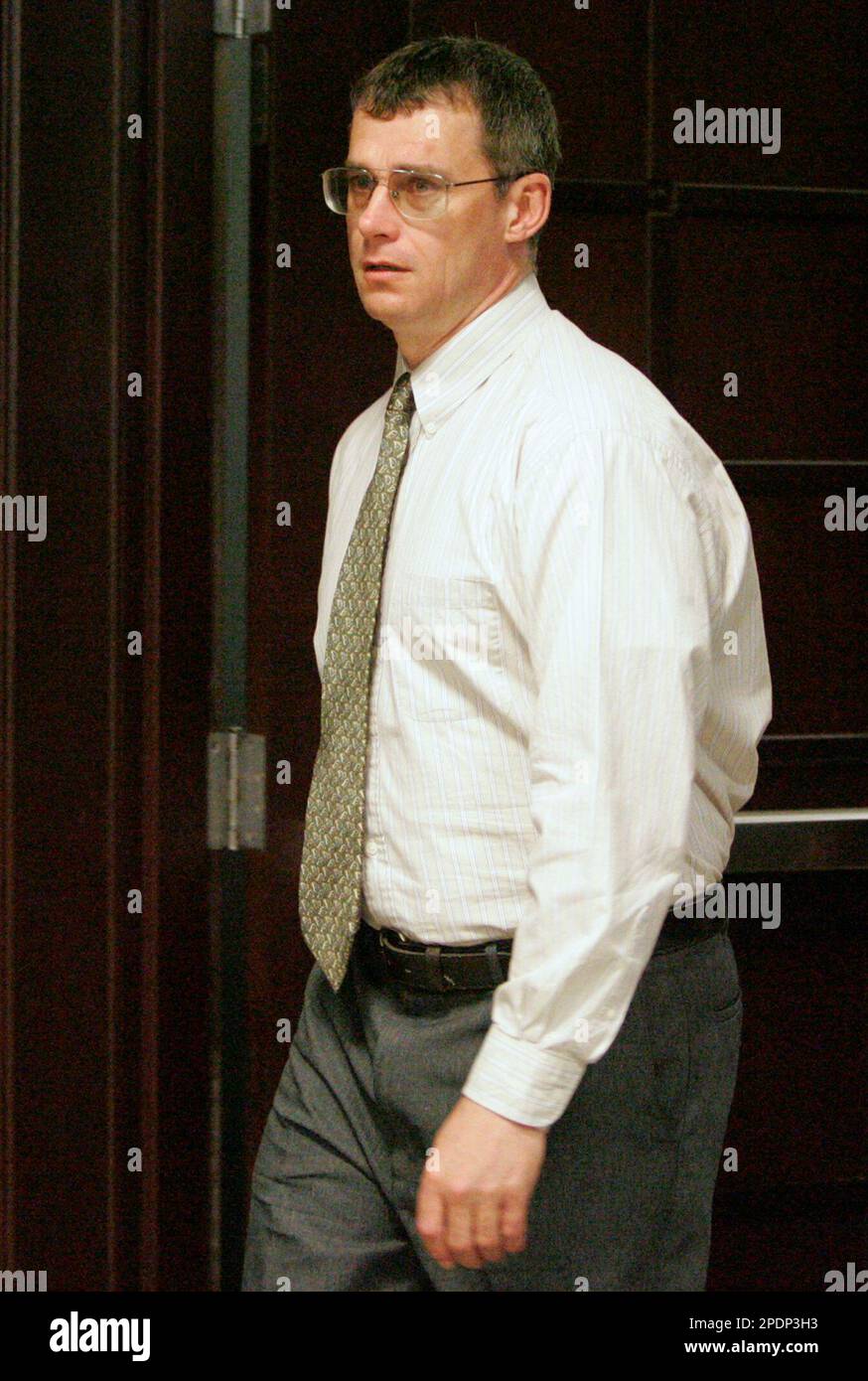 James Trimble enters court during his triple murder trial Wednesday ...