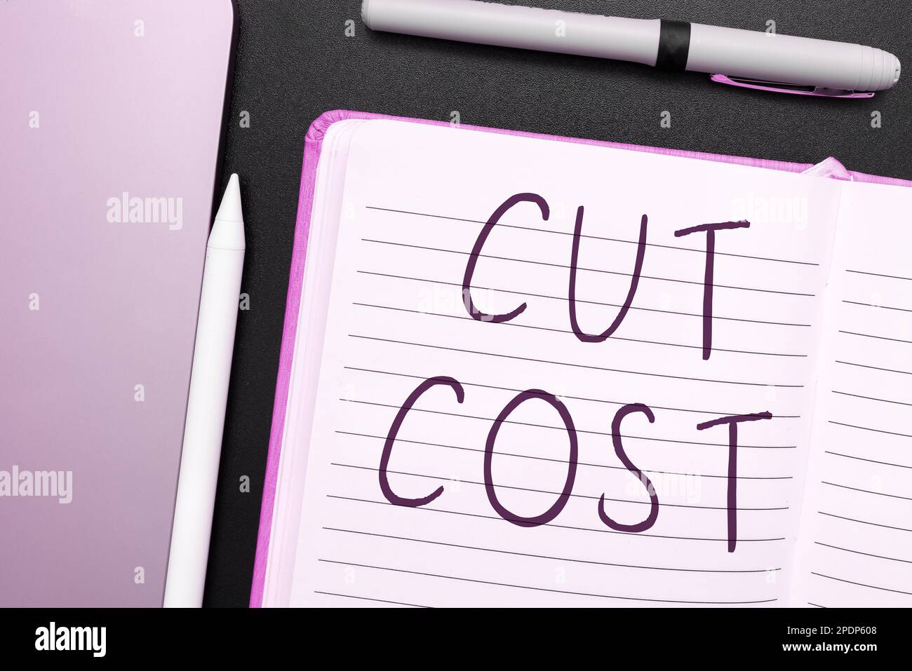 Hand writing sign Cut Cost. Concept meaning Measures implemented to ...