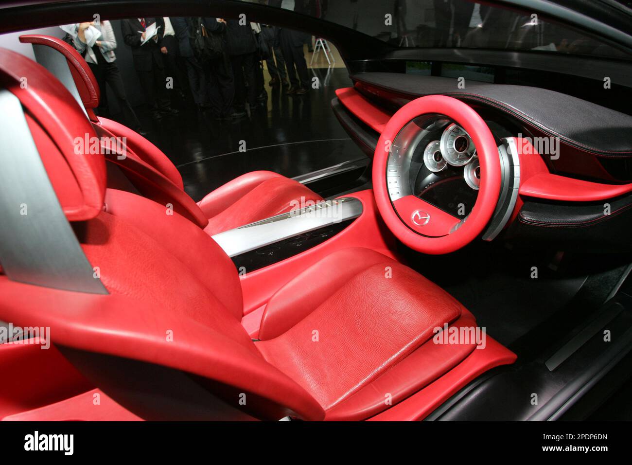 Stylized steering wheel and driver's seat of Mazda Motor Corp.'s ...