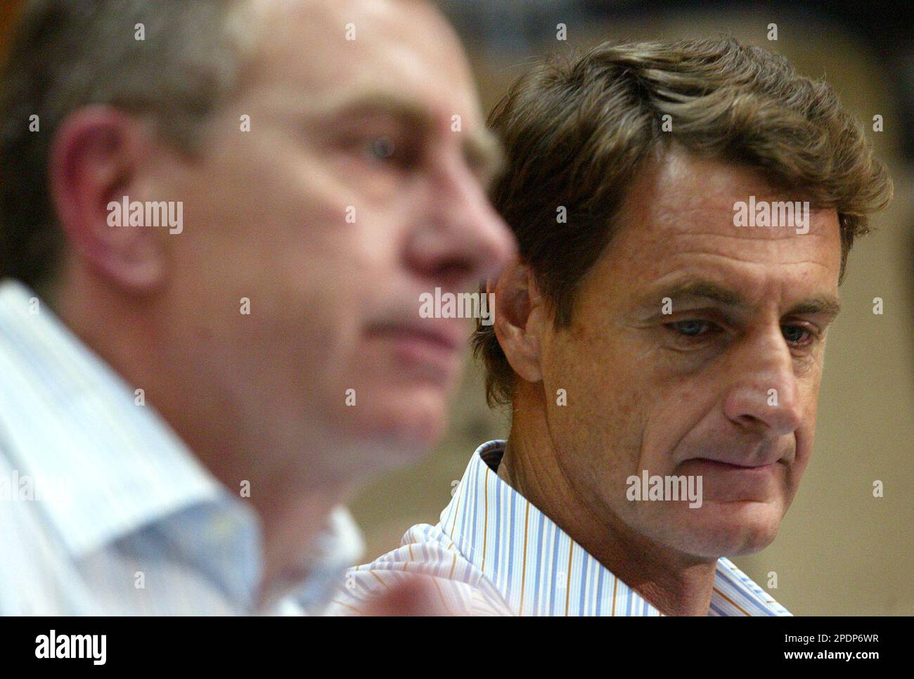 Mark Hickey, right, a good friend of Richard Anicich, left, brother of ...
