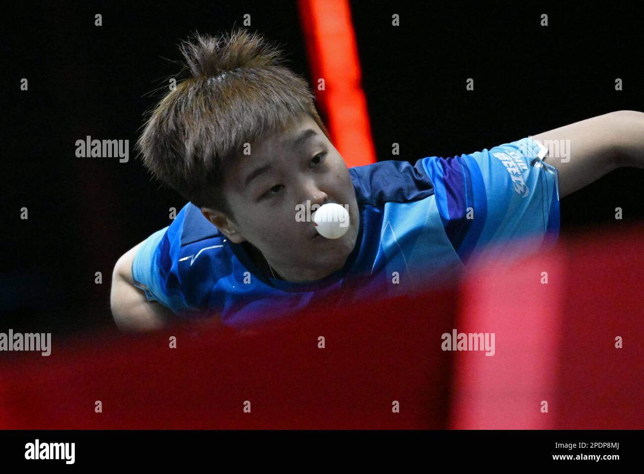 Singapore. 15th Mar, 2023. Zhang Rui of China serves during the women's ...