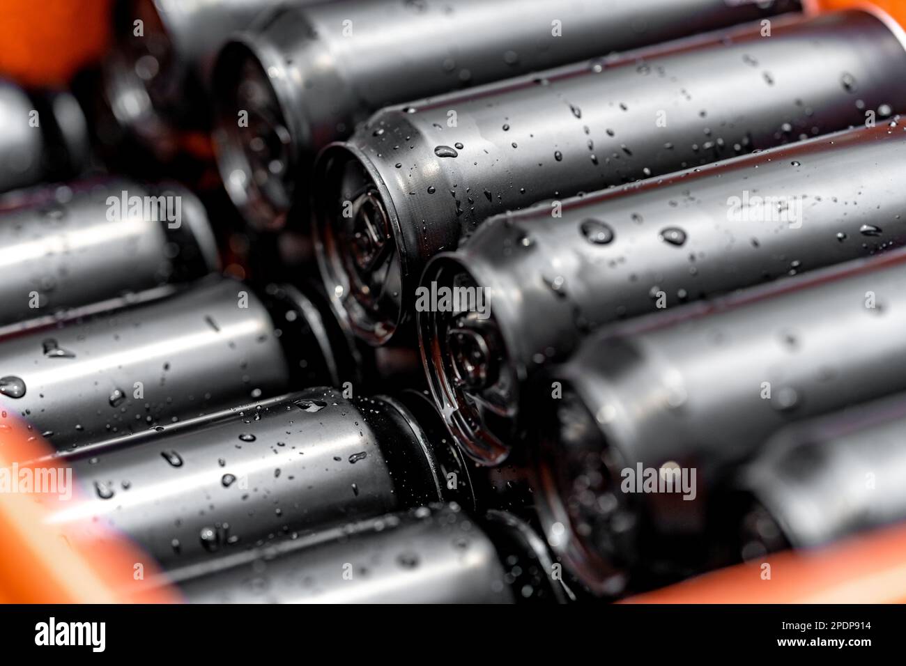 black aluminium dewy cans with drink in a crate Stock Photo - Alamy