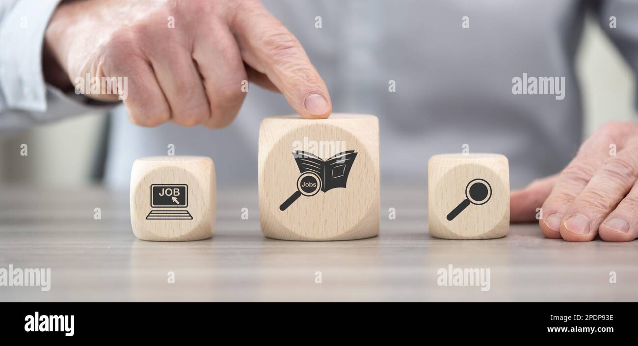 Wooden blocks with symbol of job search concept Stock Photo - Alamy