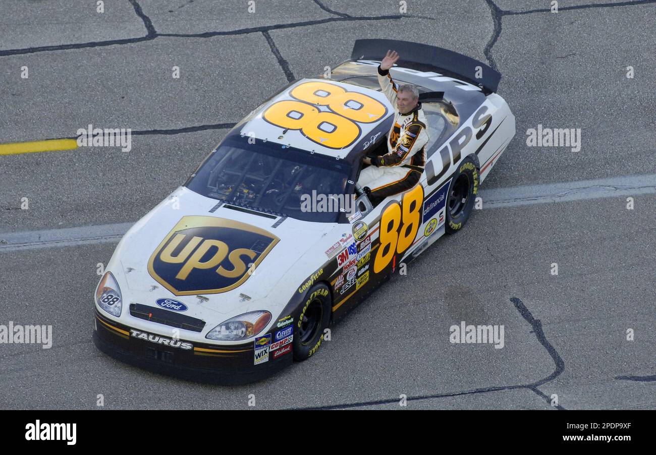 NASCAR driver Dale Jarrett waves to the crowd after winning the UAW ...
