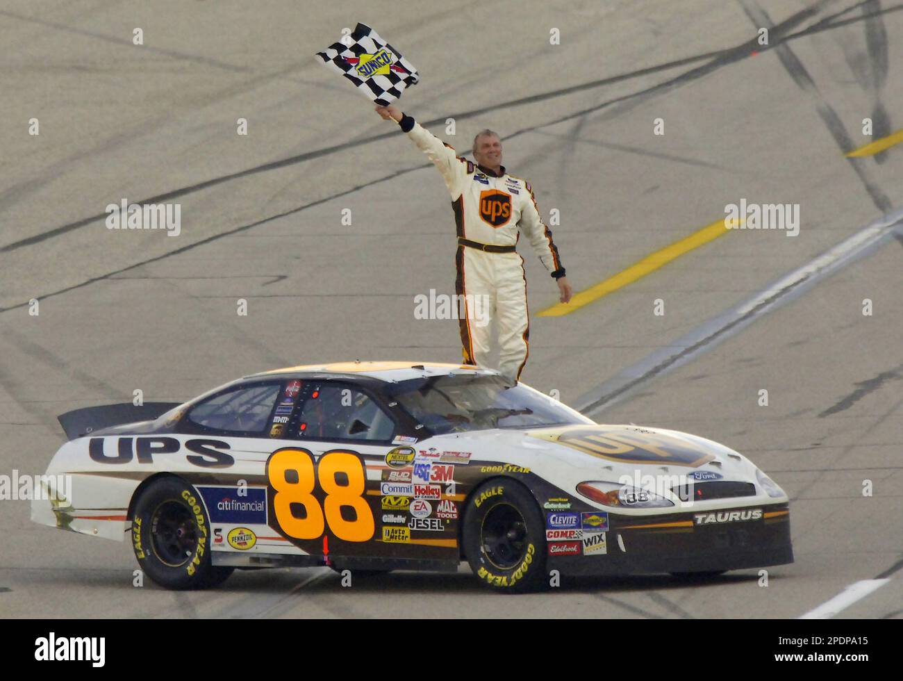 NASCAR driver Dale Jarrett reacts after winning the UAW-Ford 500 race ...