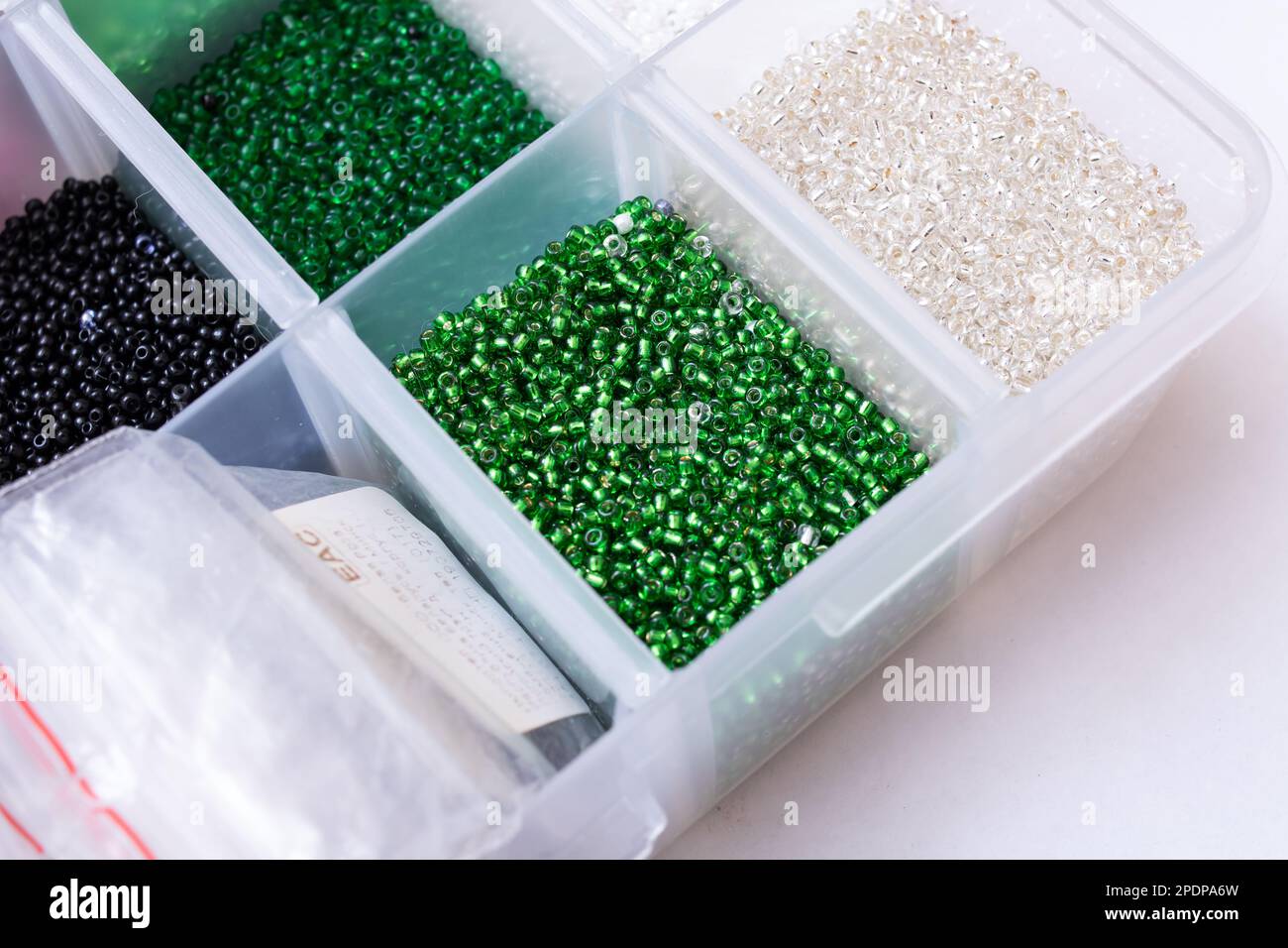 Plastic containers different beads hi-res stock photography and images ...