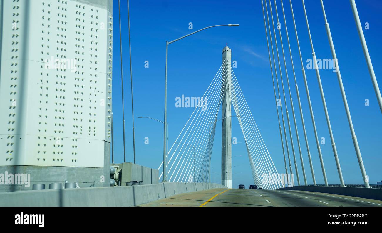 A minimalistic view of the modern suspension bridge structure on the ...